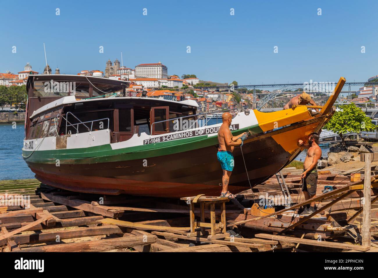 Men working in the boats Stock Photo - Alamy