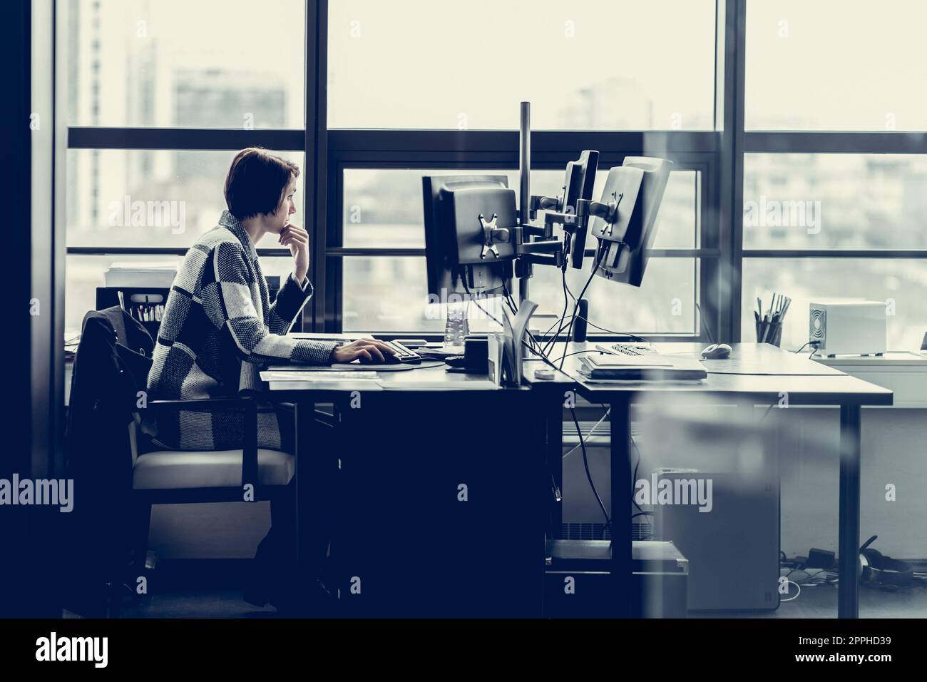 Confident independent business woman working in corporate office ...
