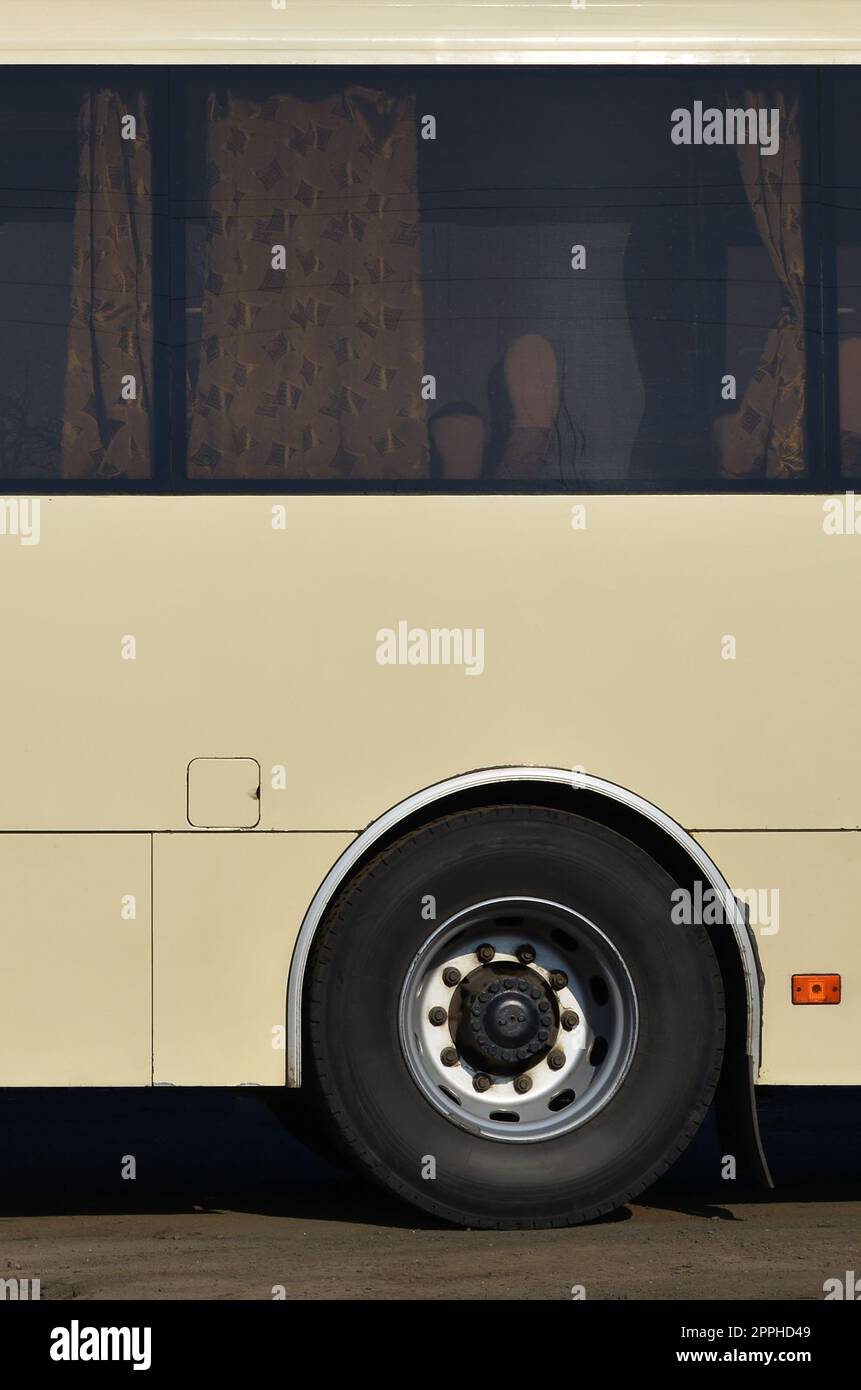 Photo of the hull of a large and long yellow bus with free space for ...