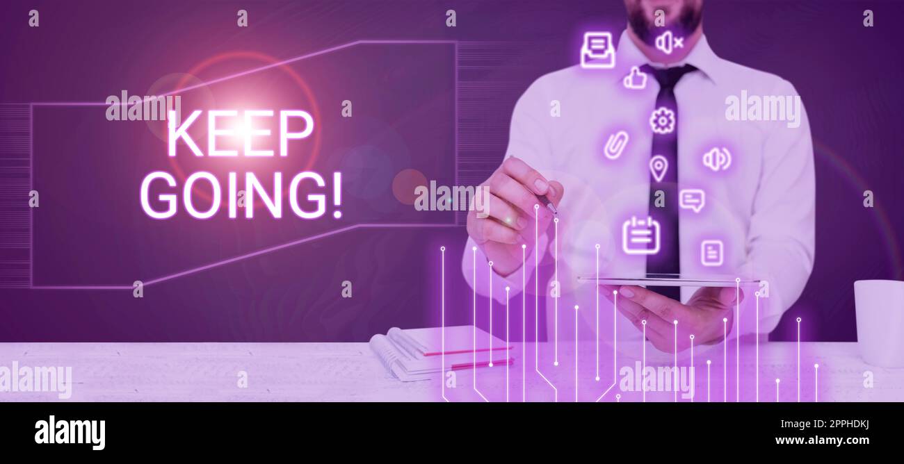 Conceptual caption Keep Going. Word Written on to continue living ...