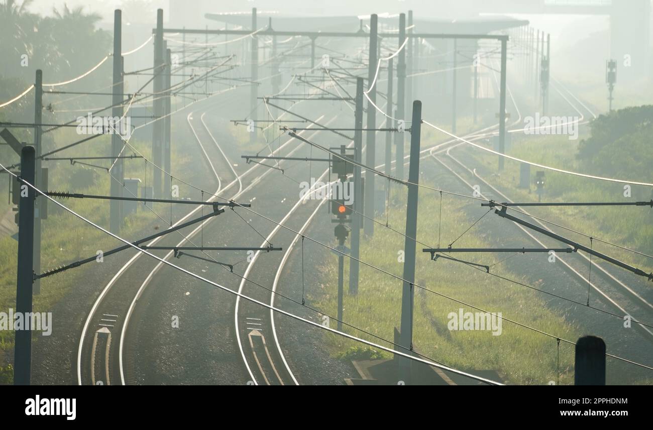 Train railway in morning sun Stock Photo - Alamy