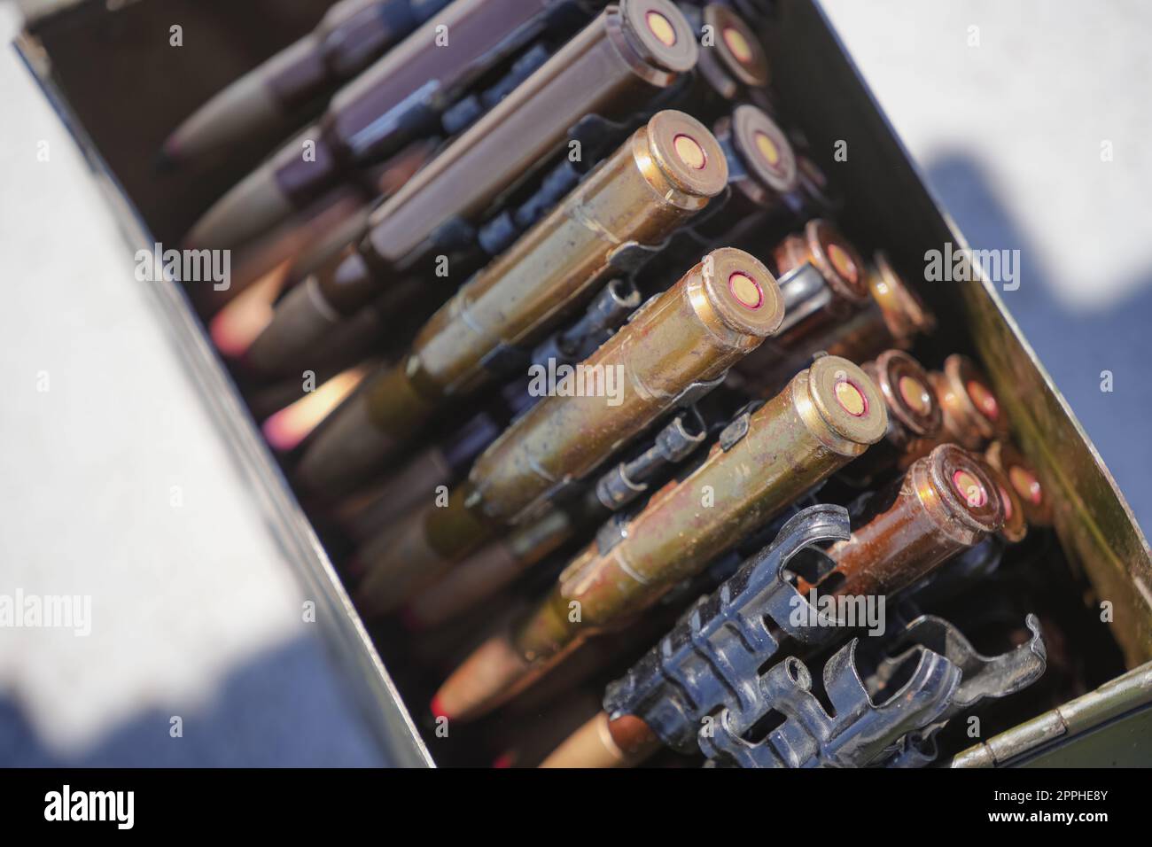 Machine gun belt loaded with cartridges Stock Photo - Alamy