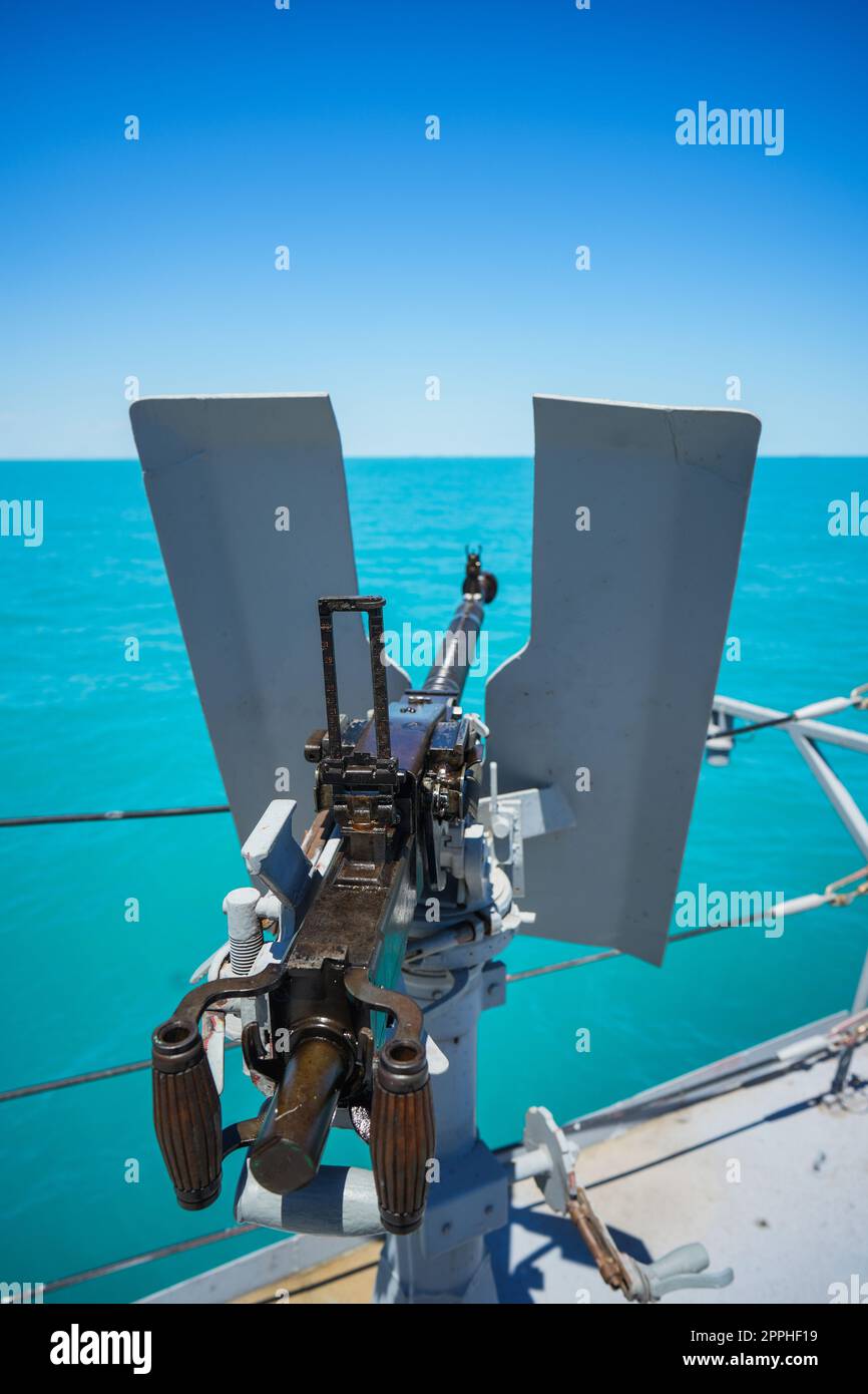 Automated machine gun on the deck of a military ship Stock Photo - Alamy
