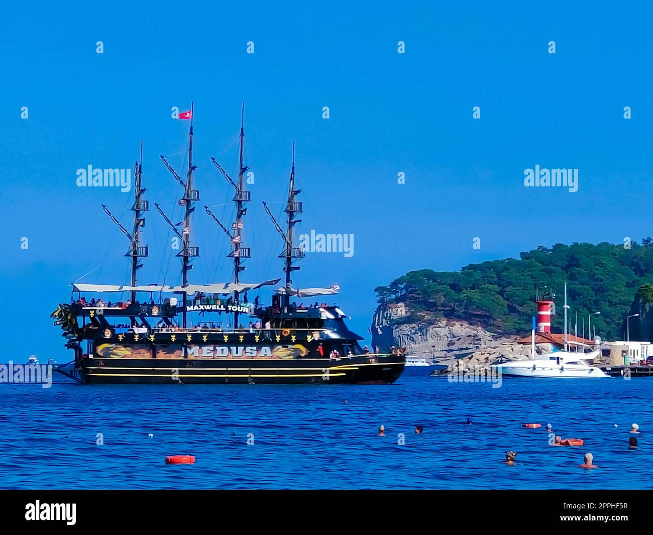 Vintage mast wooden sailing ship for sea tours. Touristic pirate ship ...