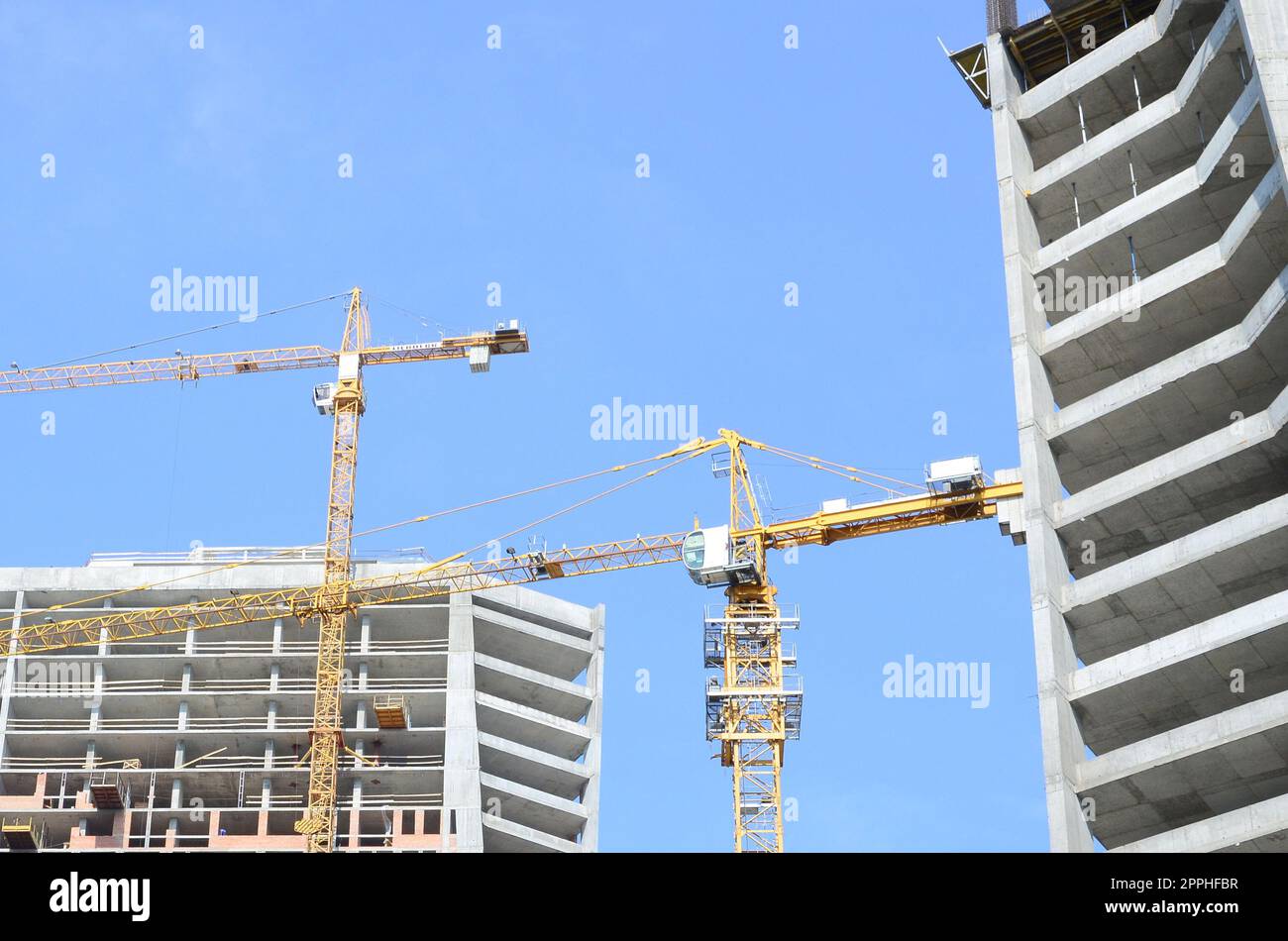 Construction site. High rise multi storey buildings under construction ...