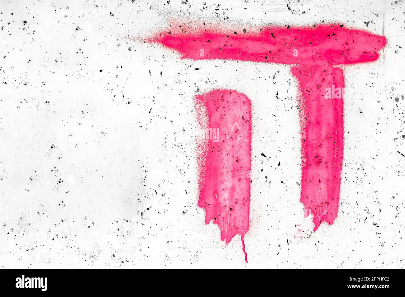 Pink IT writing on a white wall Stock Photo - Alamy