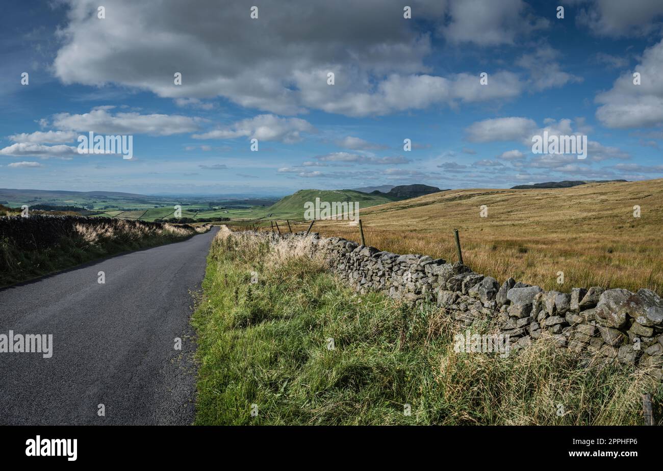 The road from Airton as it descends to Settle, Yorkshire Dales, UK ...