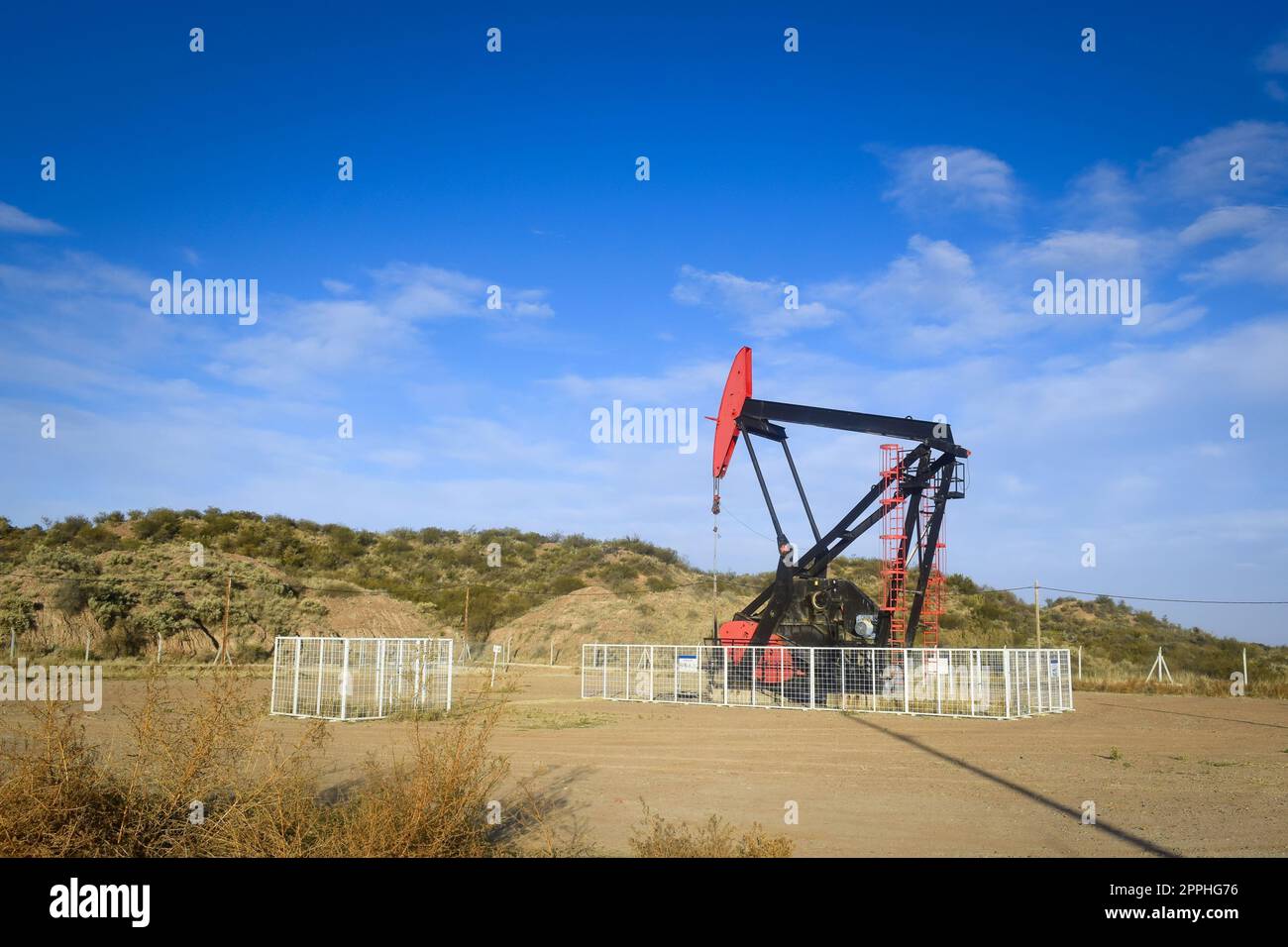 Oil extraction pumpjack in the desert of Mendoza, Argentina Stock Photo ...
