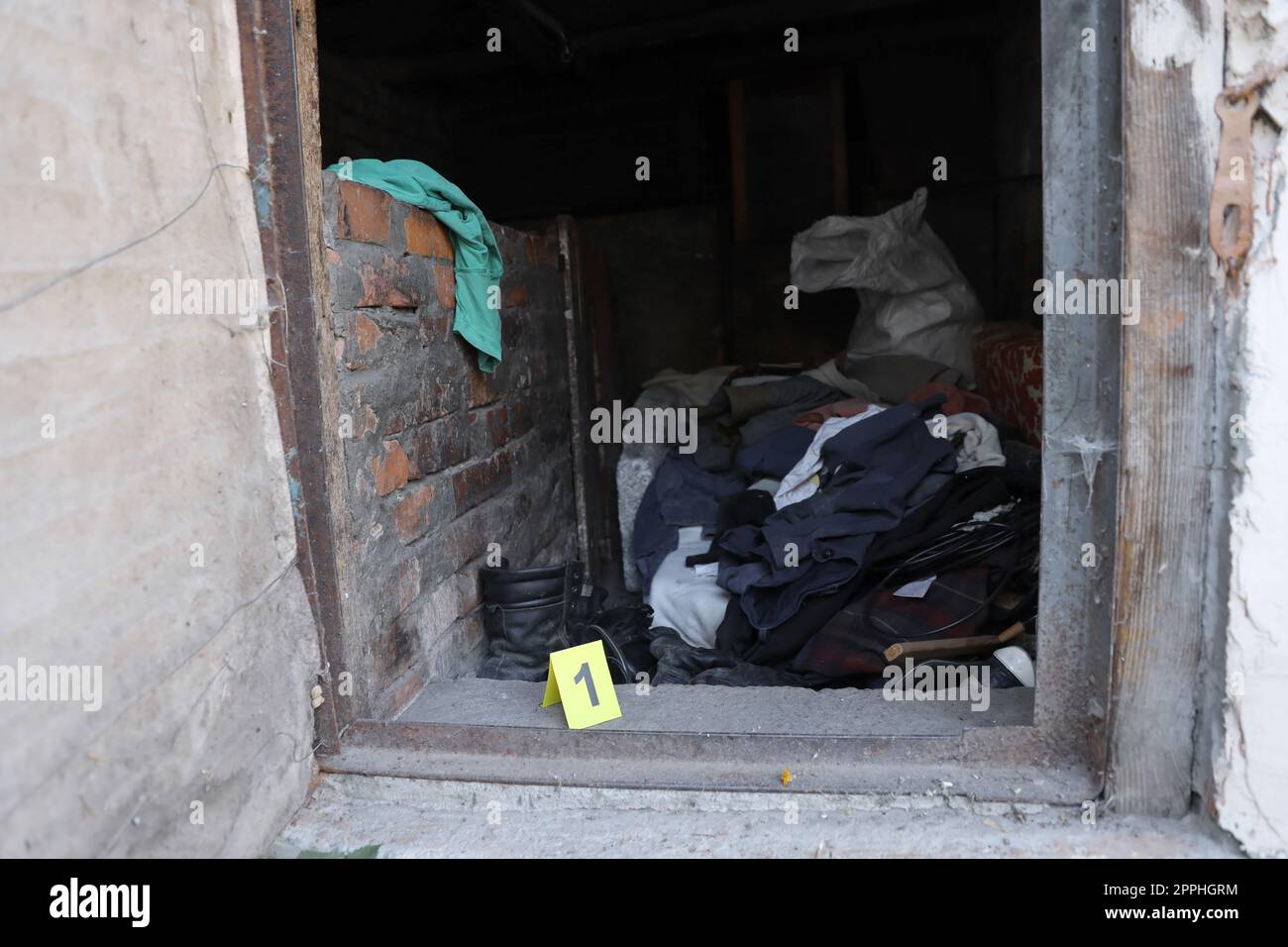 Evidence with yellow CSI marker for evidence numbering on the ...