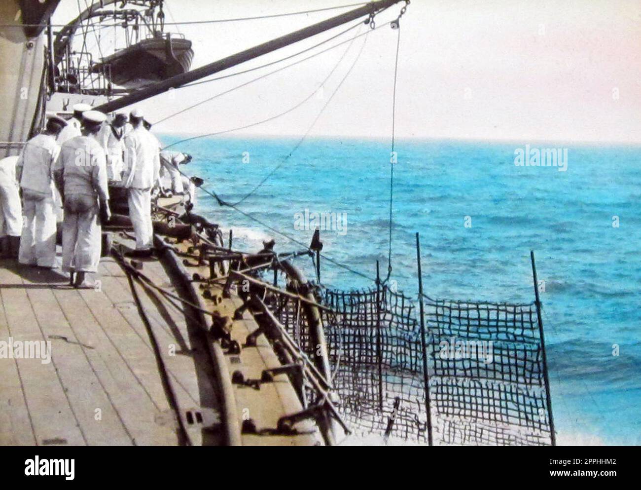 Dropping a target for gun practice from a Royal Navy ship, early 1900s ...