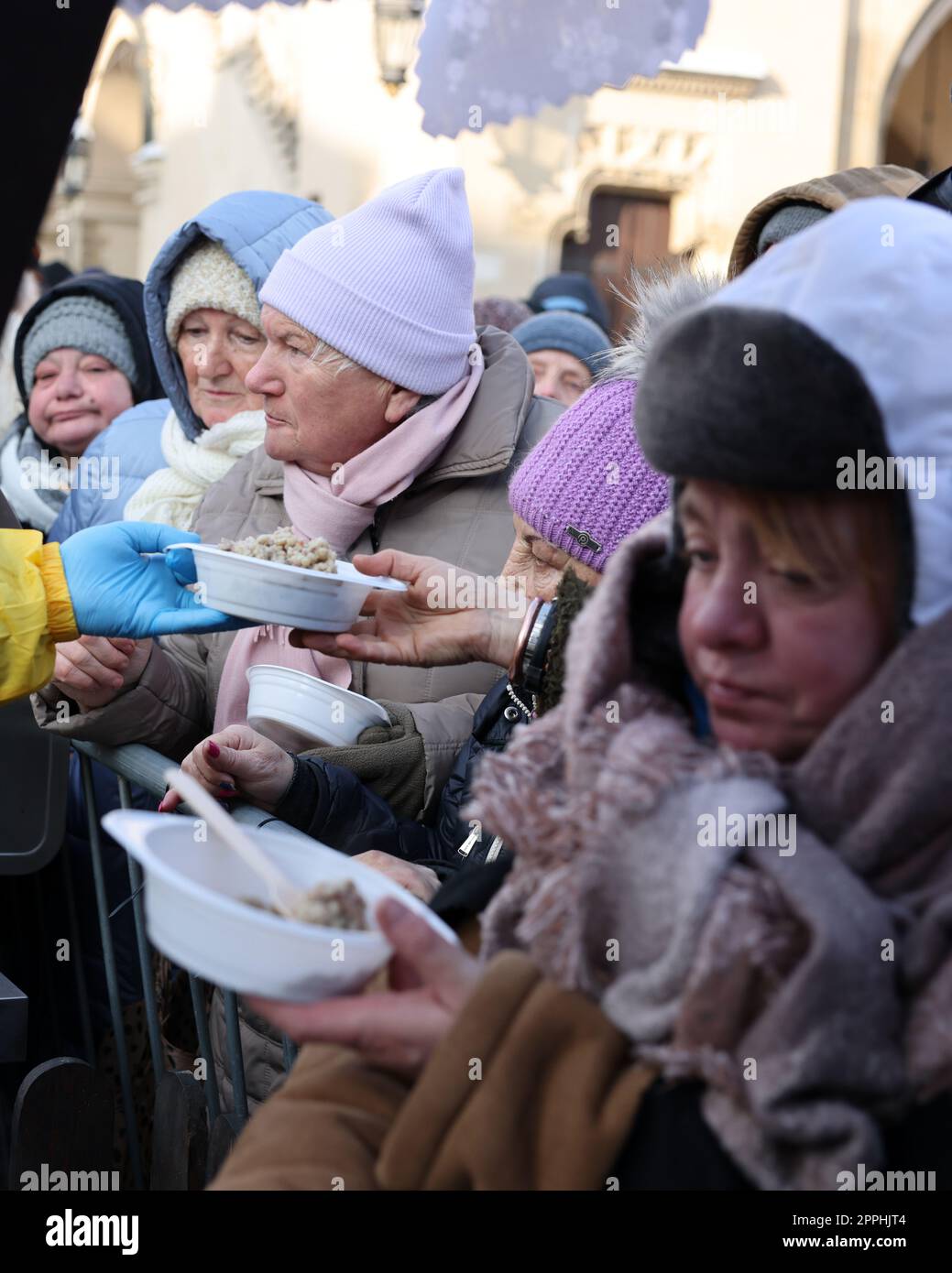 Christmas Eve for poor and homeless on the Main Square in Cracow Stock ...