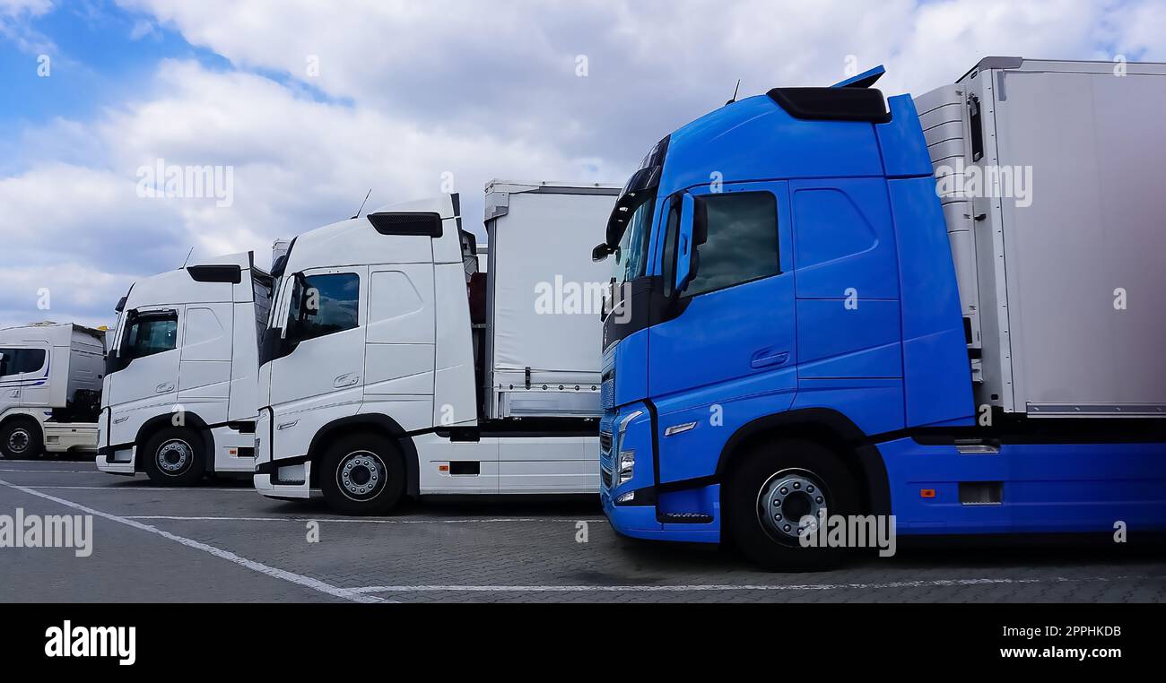 Trucks at parking lot. Delivery Trucks. Cargo Shipping. Lorry. Industry ...