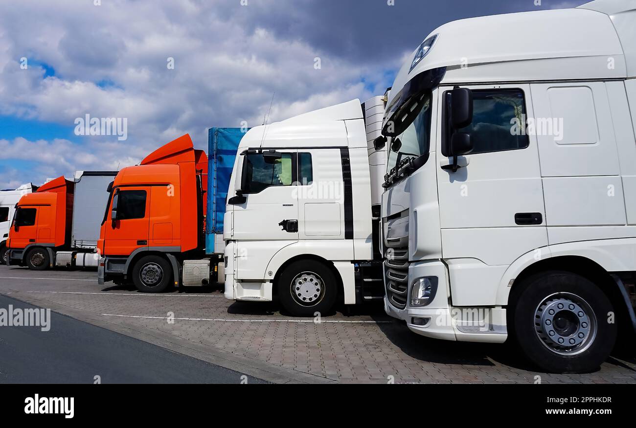 Trucks at parking lot. Delivery Trucks. Cargo Shipping. Lorry. Industry ...