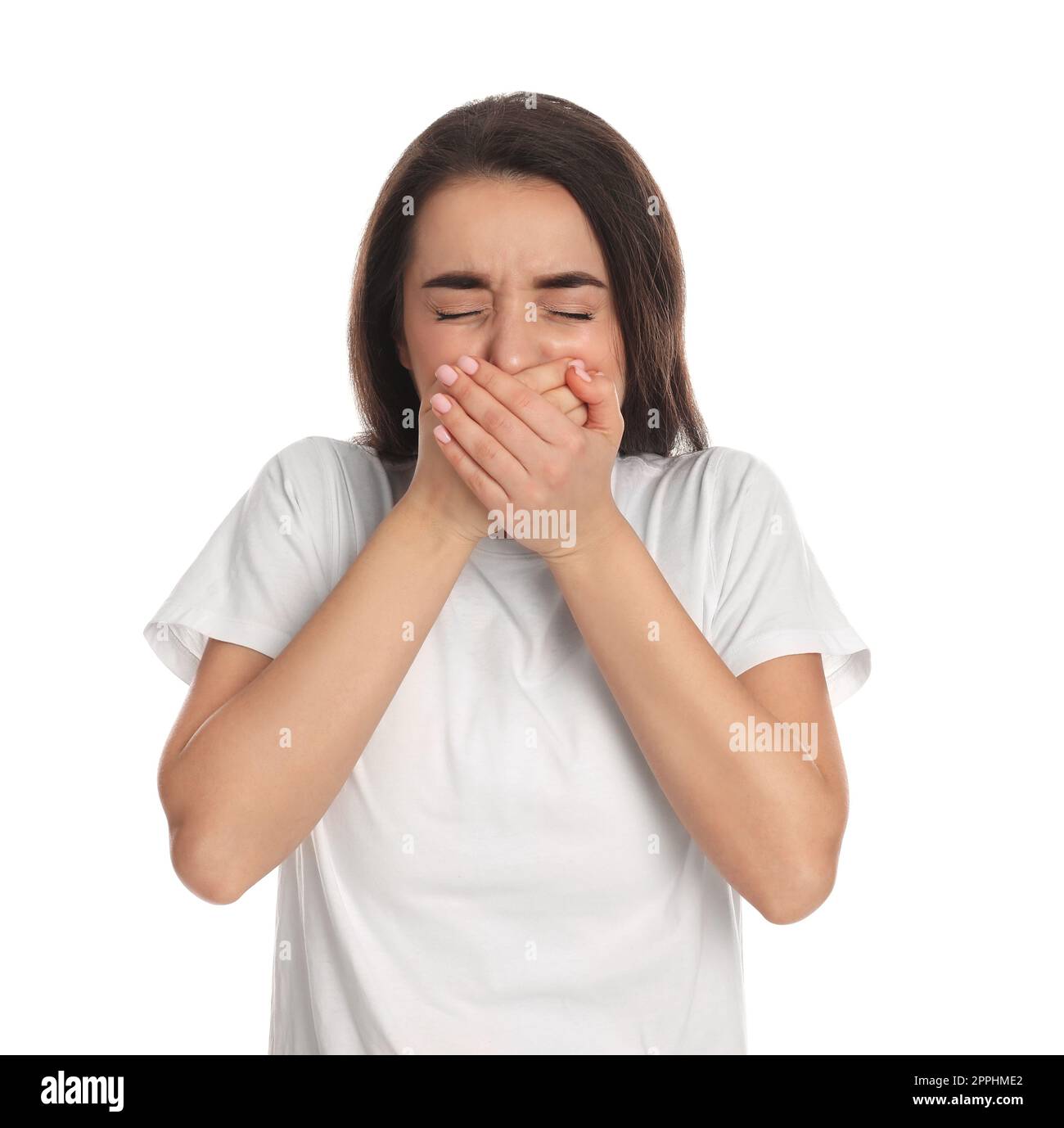 Young woman suffering from nausea on white background. Food poisoning ...
