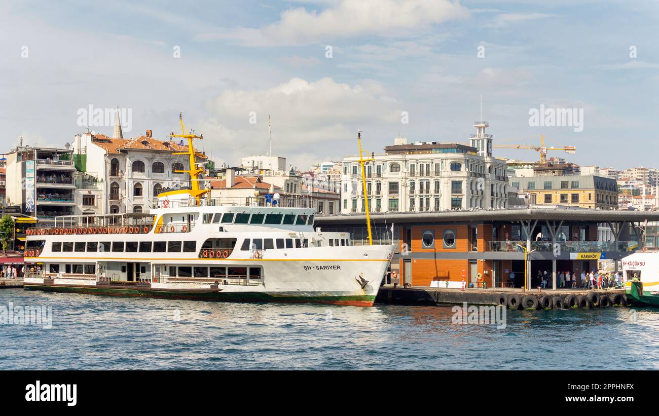 Ferry boat docked at Karakoy ferry terminal, in a sunny summer day ...