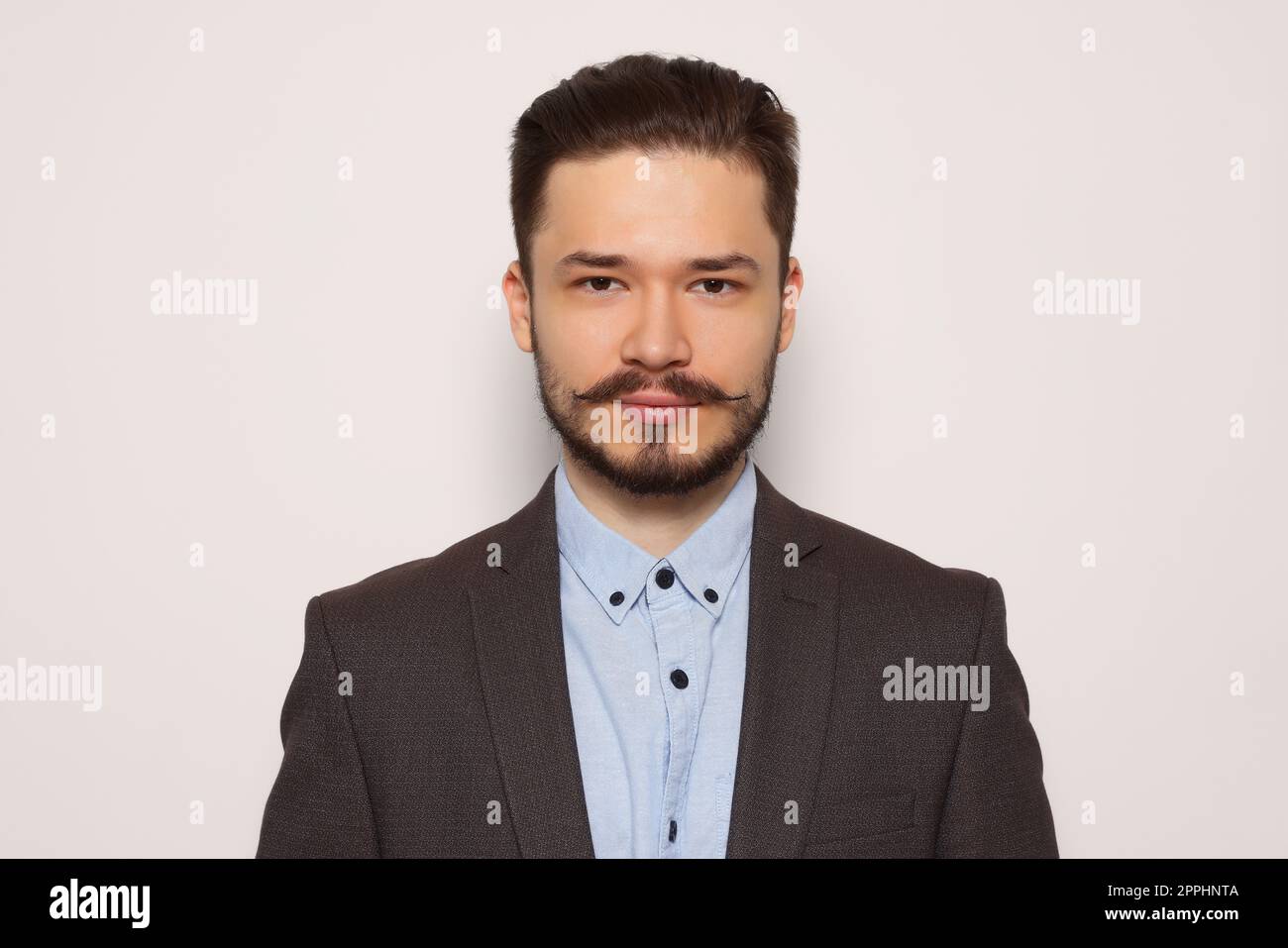 Light grey suit hi-res stock photography and images - Alamy