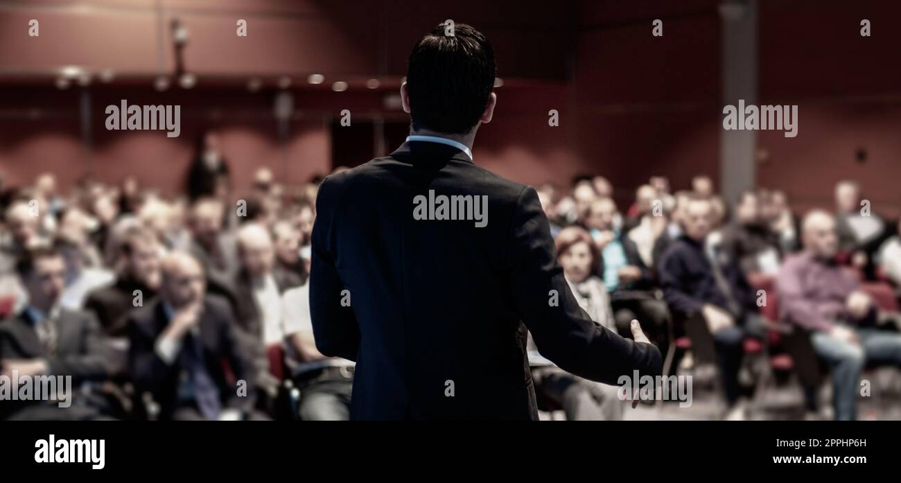 Public speaker giving talk at business event Stock Photo - Alamy