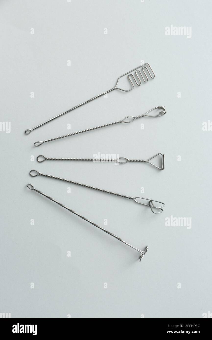 Set of logopedic probes for speech therapy on light grey background ...