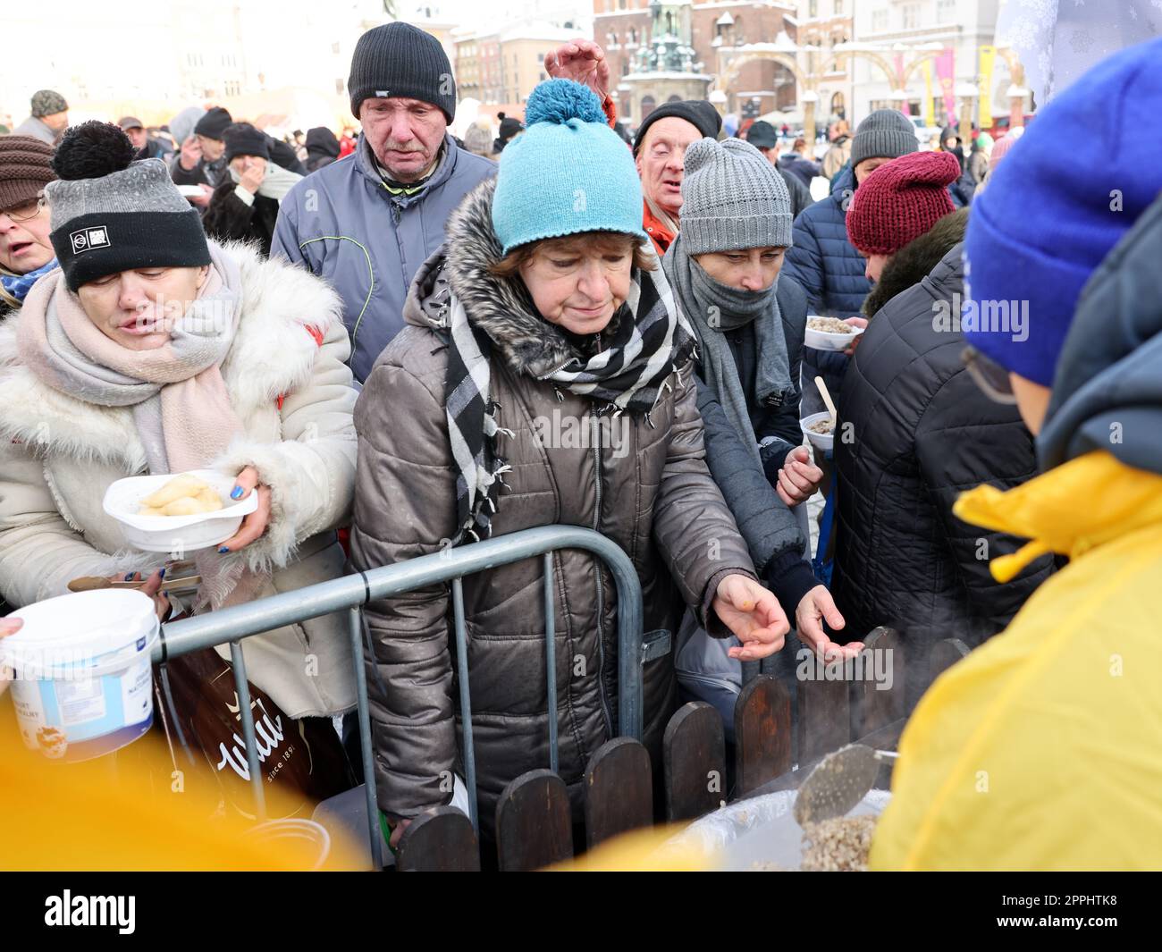 Christmas Eve for poor and homeless on the Main Square in Cracow Stock ...