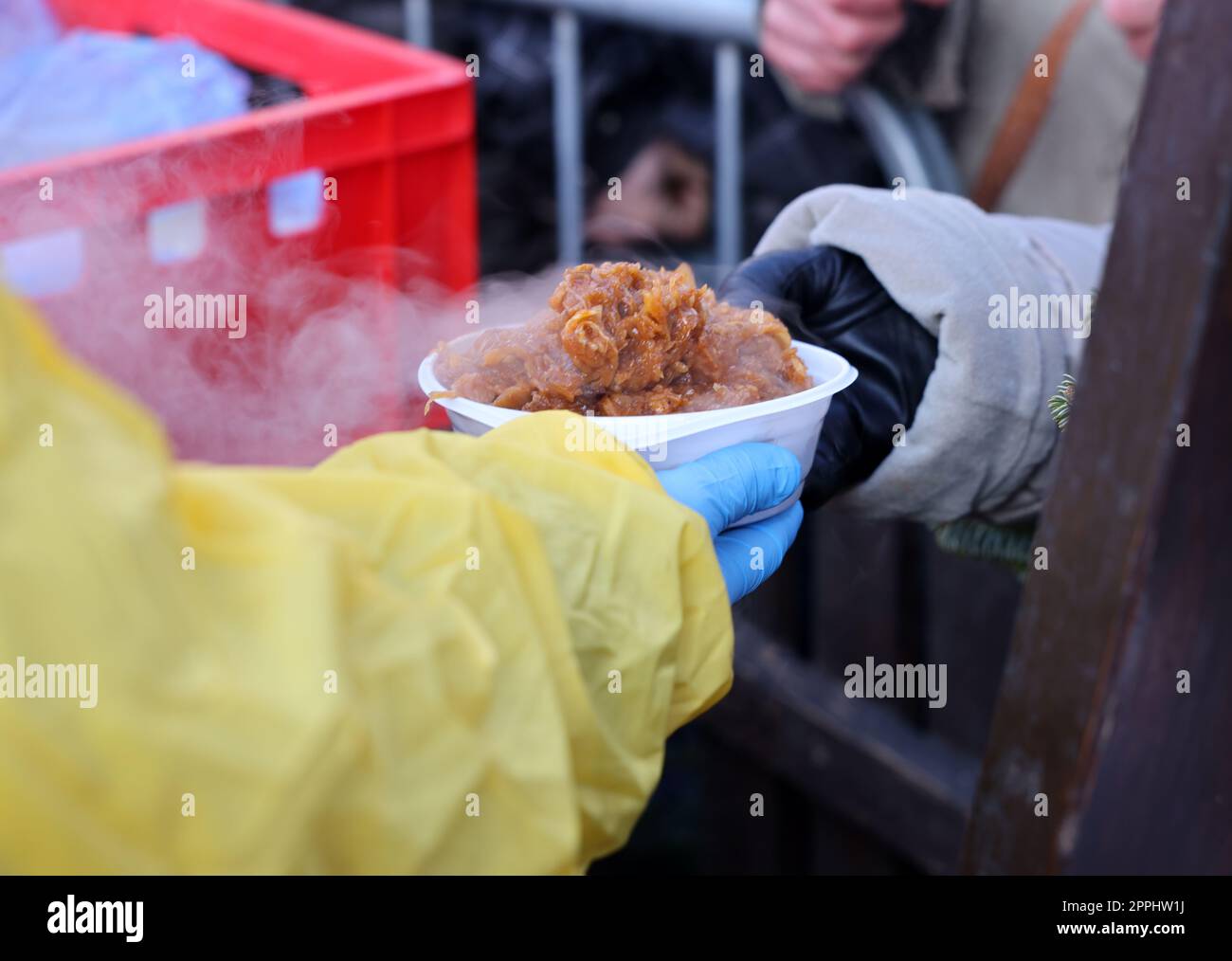 Warm food for the poor and homeless Stock Photo - Alamy