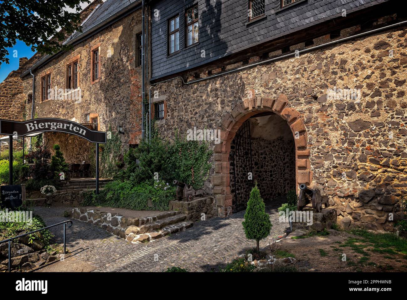 The deserted entrance area of a beer garden in front of the entrance ...