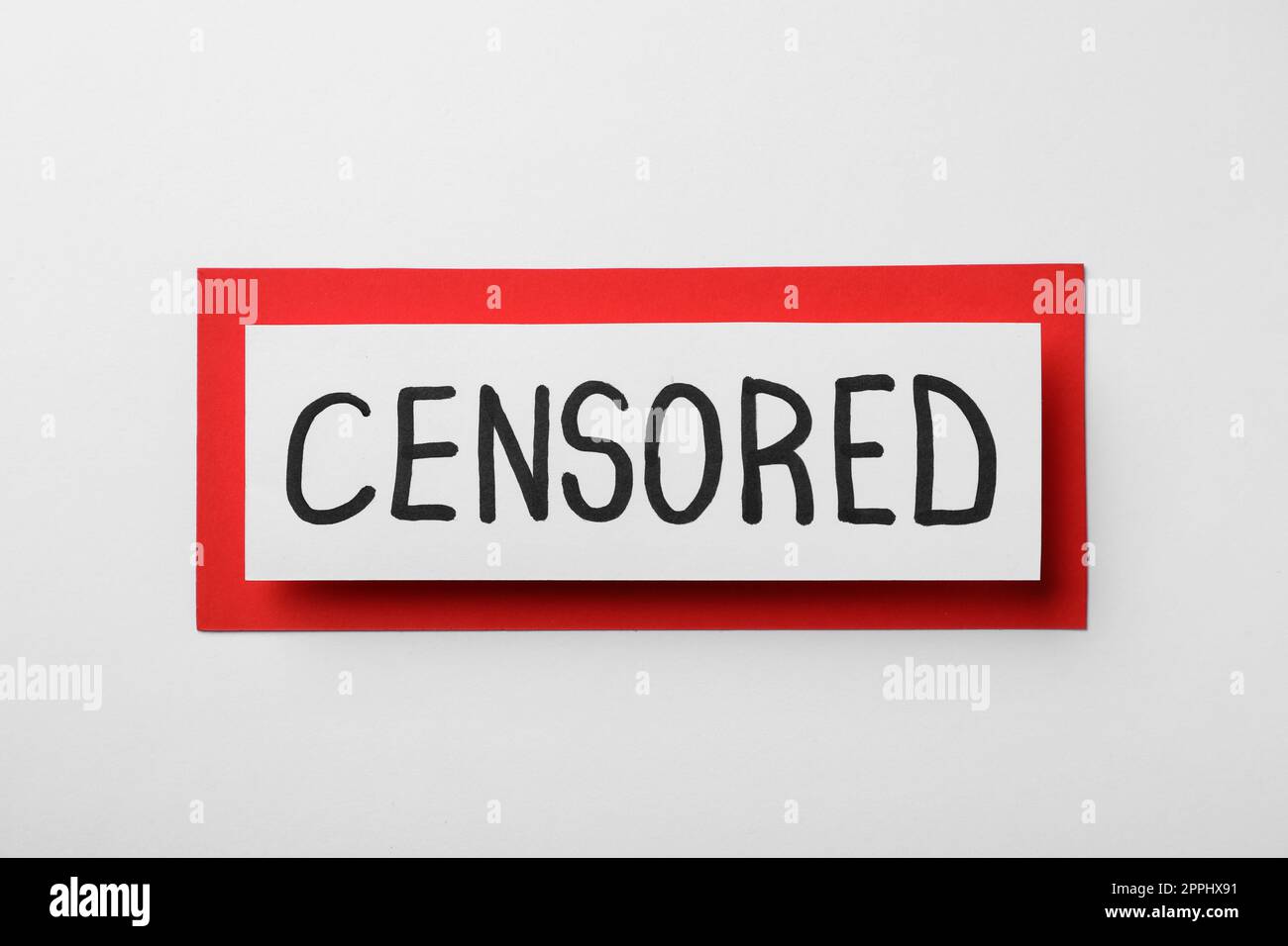 Card with word Censored on white background, top view Stock Photo - Alamy