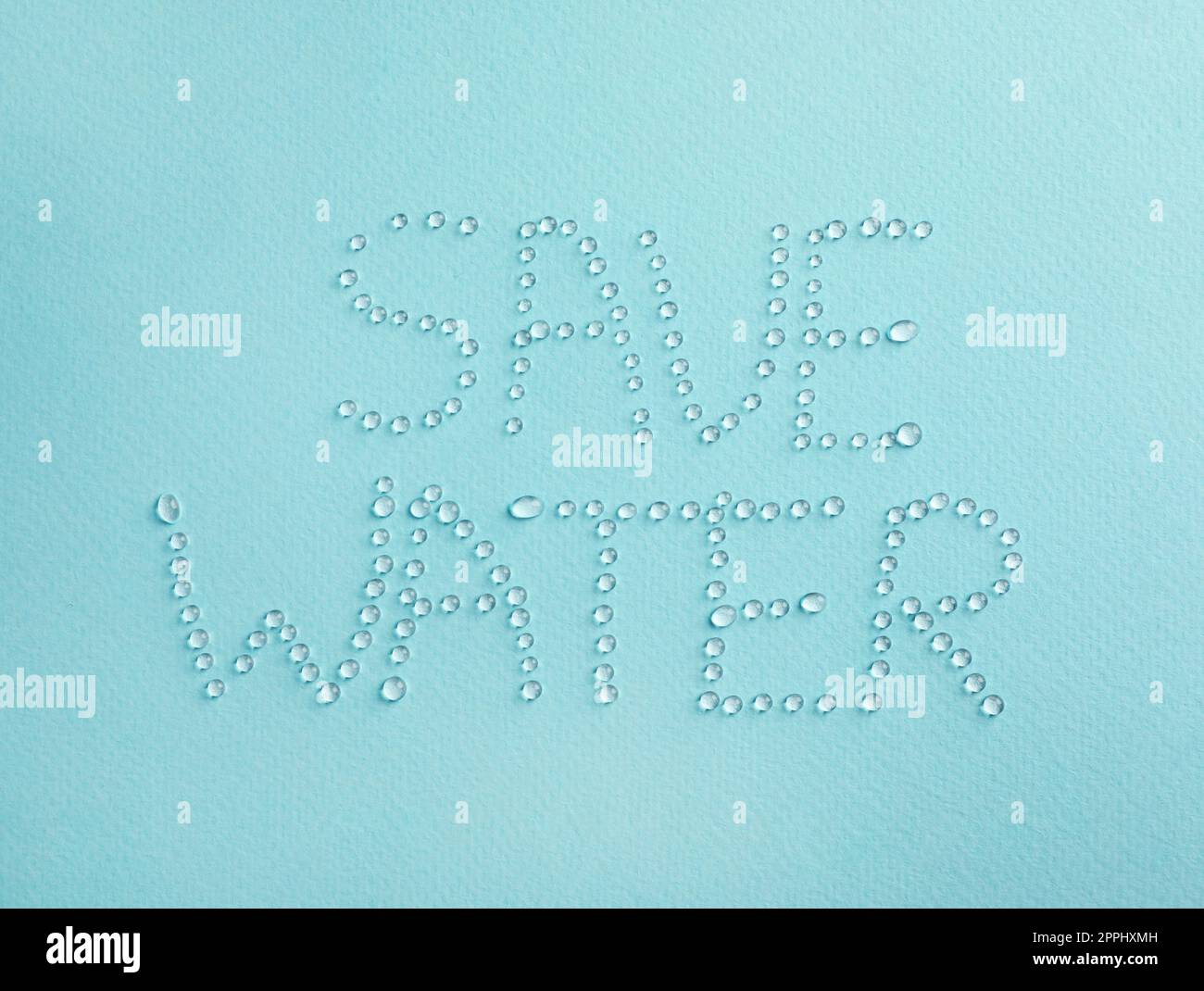 Inscription Save Water made of drops on light blue background, top view ...