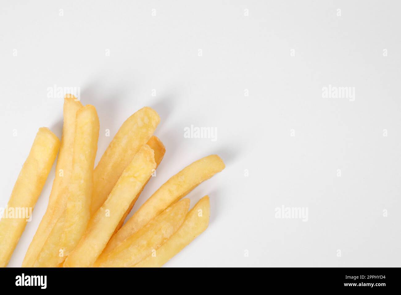 Delicious french fries on white background, flat lay. Space for text ...