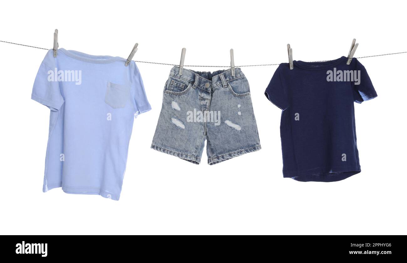 Different clothes drying on washing line against white background Stock ...