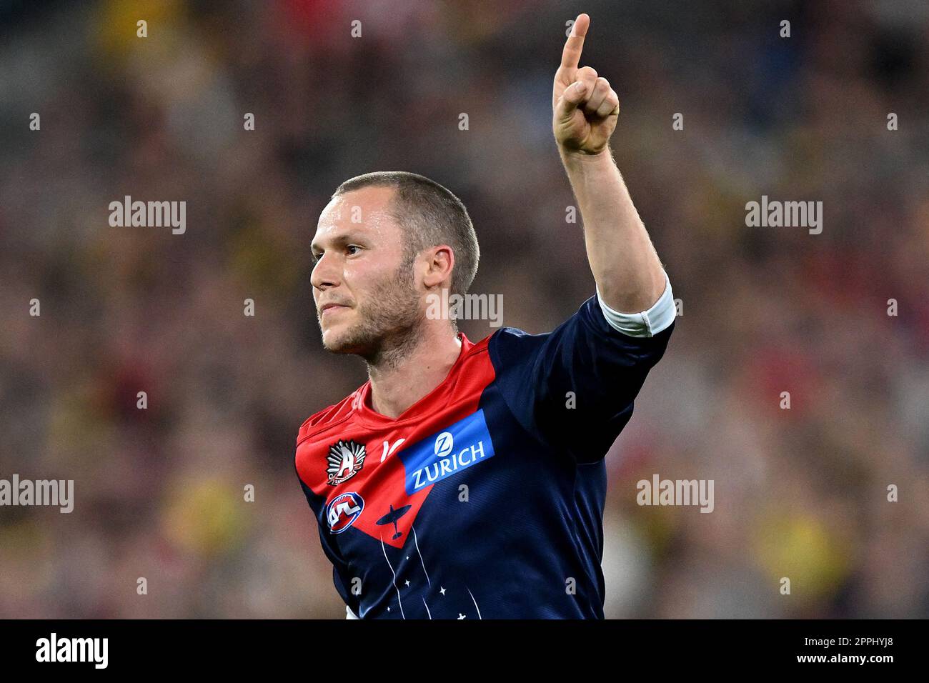 Ed Langdon of the Demons reacts after kicking a goal during the AFL ...