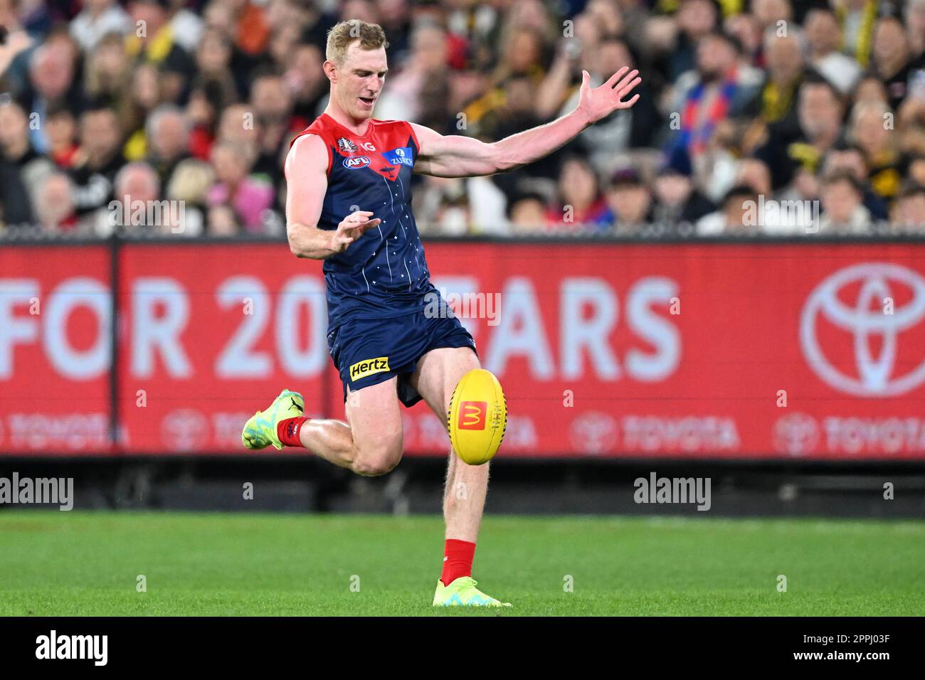 Harrison Petty of the Demons kicks a goal during the AFL Round 6 match ...