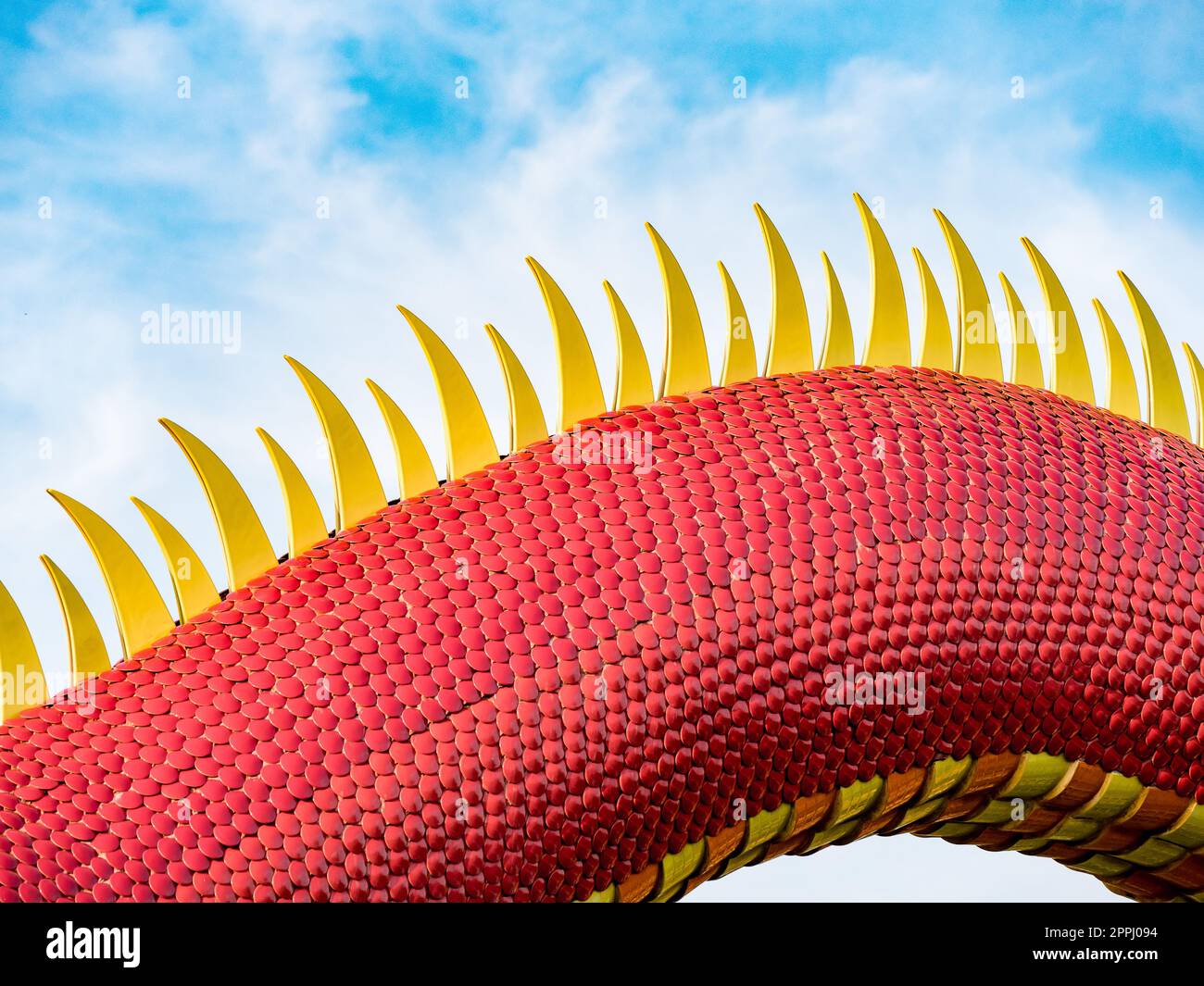 dragon scales pattern , made from earthenware , red color, blue sky ...