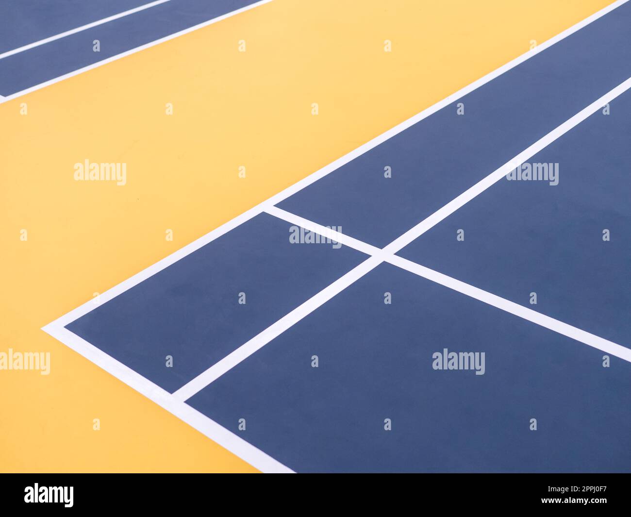 Corner of badminton court, blue and yellow color Stock Photo - Alamy