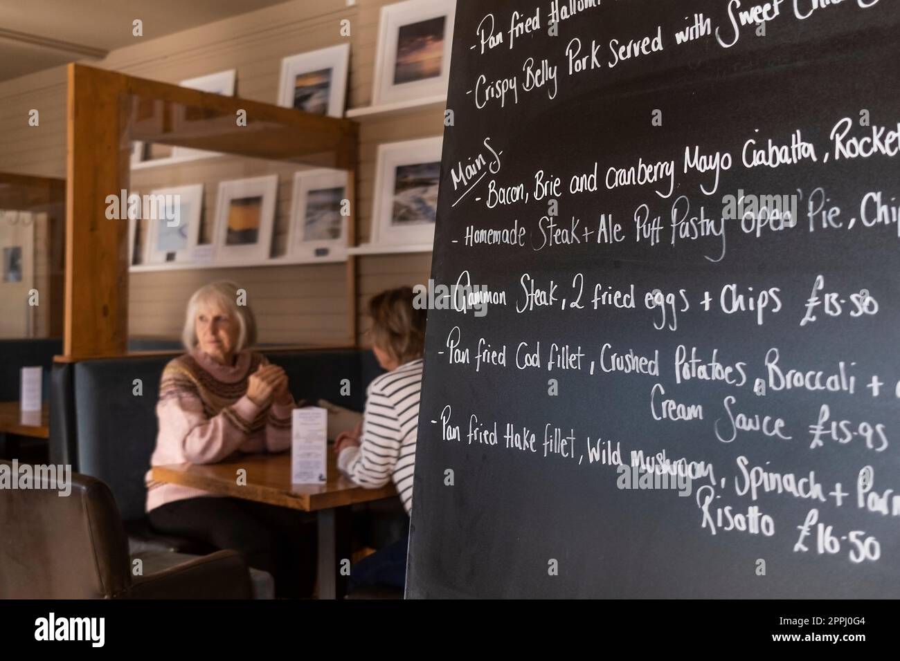 A hand written menu specials board in a restaurant in Newquay in ...