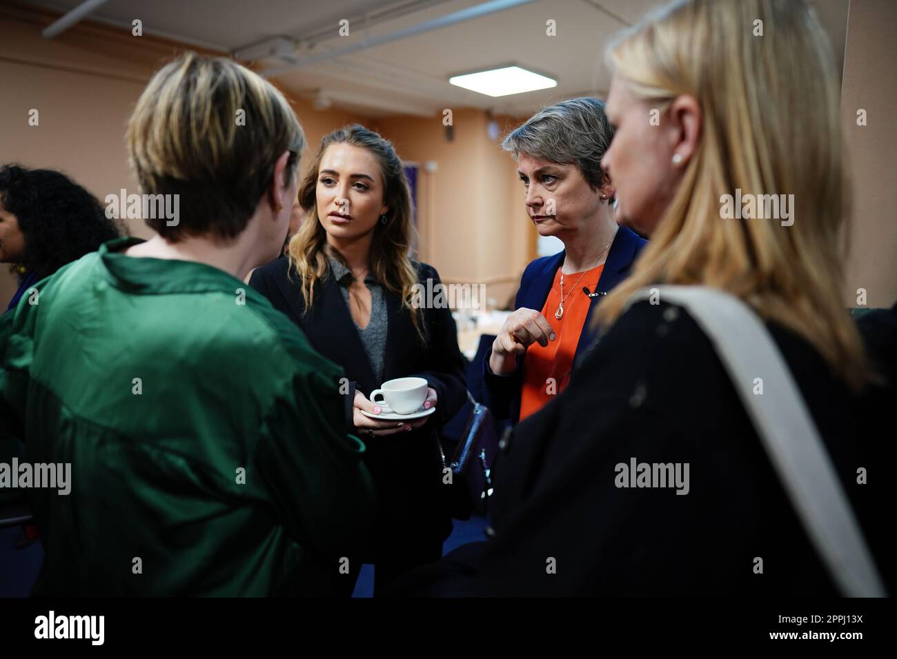 Shadow home secretary Yvette Cooper (second right) and Georgia Harrison ...