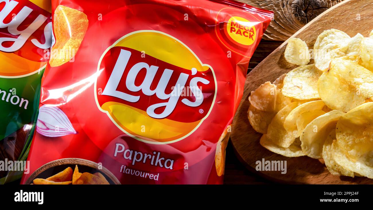 Composition with packets of Lays potato chips Stock Photo - Alamy