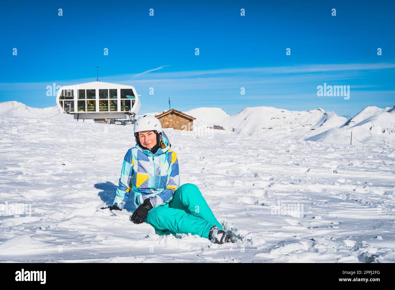 Ski model sitting on ski slope hi-res stock photography and images - Alamy