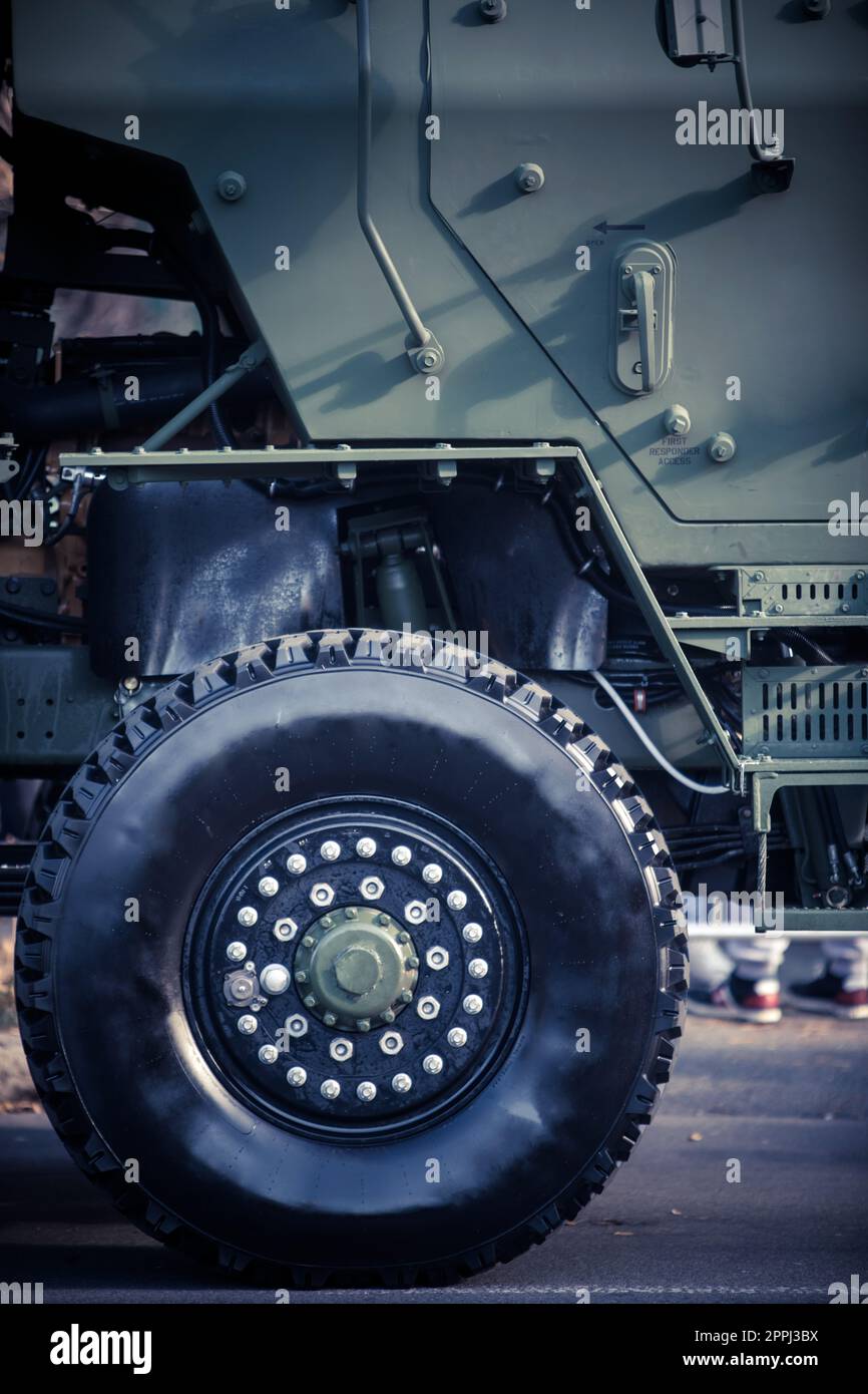 Big military vehicle wheel Stock Photo - Alamy