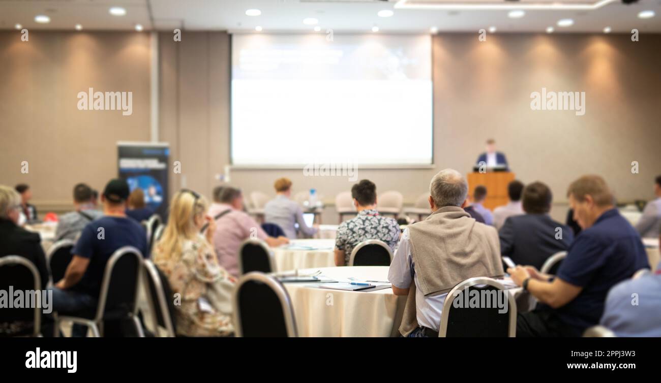 Business speaker giving a talk at business conference event Stock Photo ...