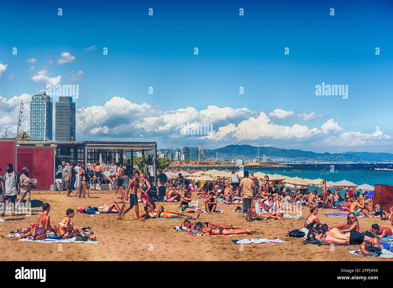 Seascape people beach on sunny hi-res stock photography and images - Alamy