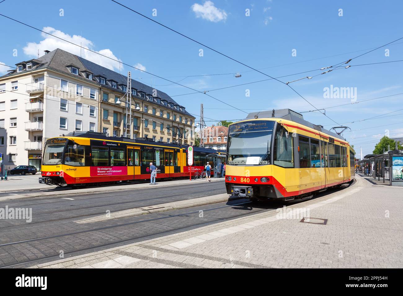 Tram-train light rail of AVG tram type GT8 public transport transit at ...