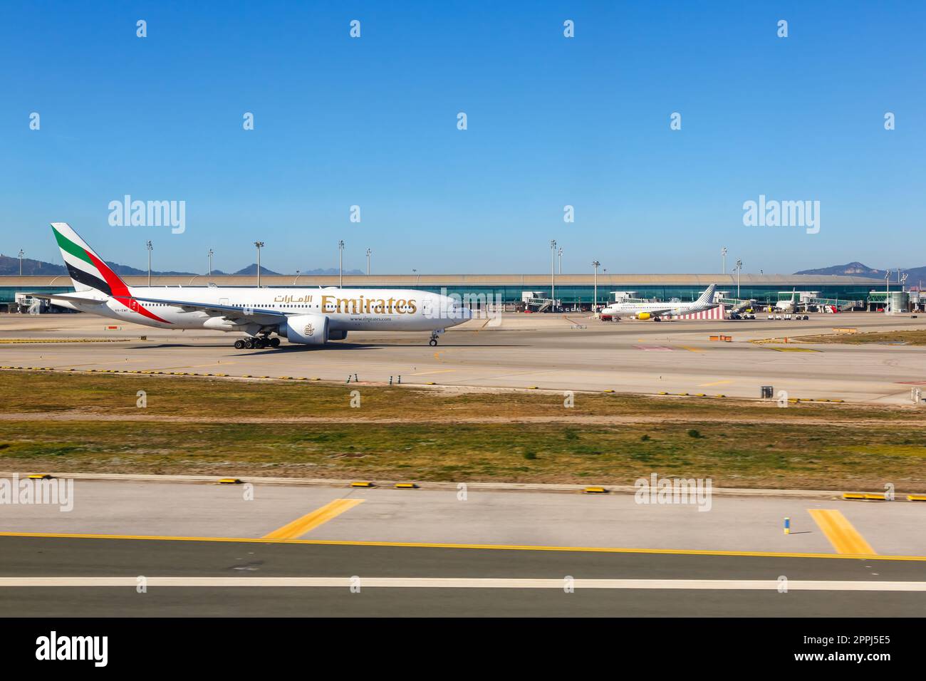 Emirates Airlines Boeing 777-200LR airplane Barcelona airport in Spain ...