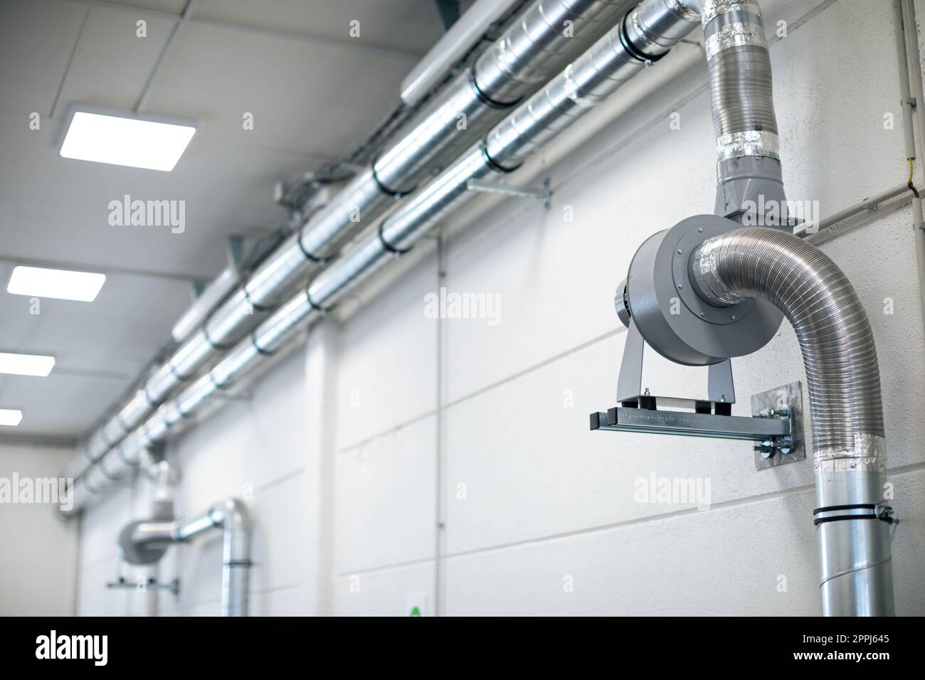 Air flow system in a modern building of a car workshop Stock Photo - Alamy