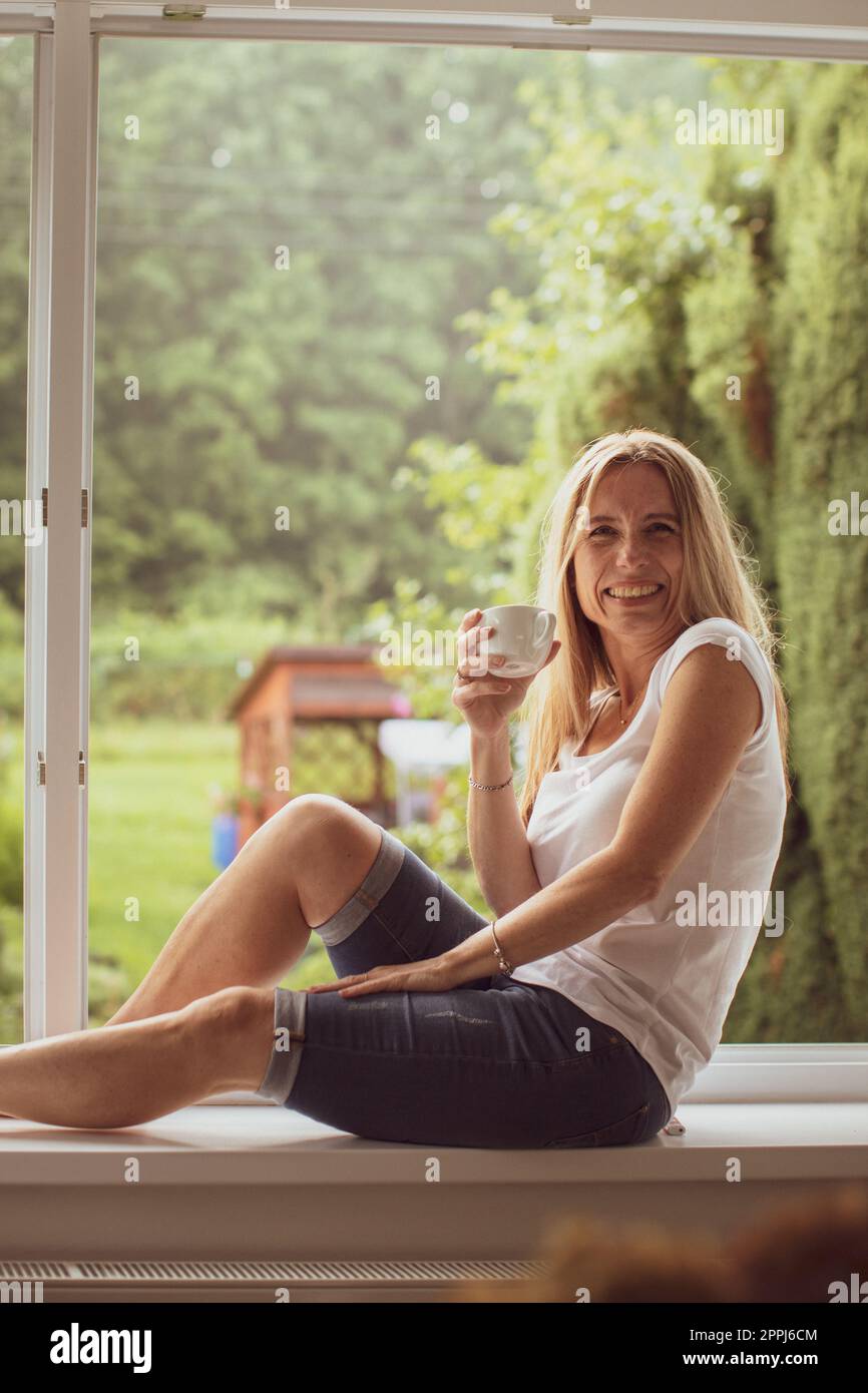 Woman relaxing at home no face hi-res stock photography and images - Alamy