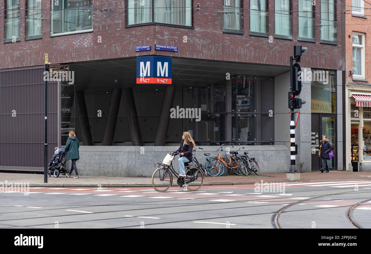 Cycling amsterdam cars hi-res stock photography and images - Alamy