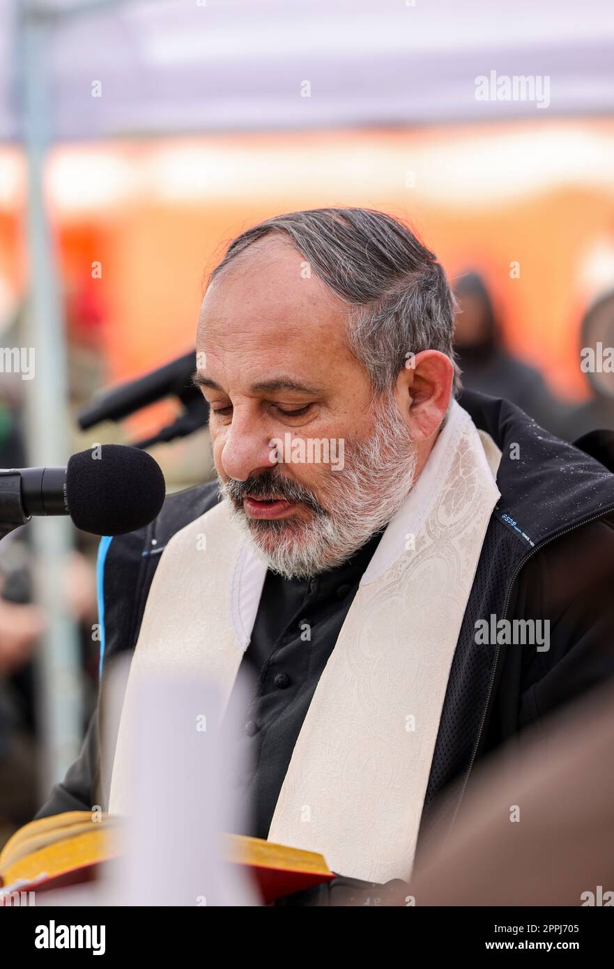 Priest Tadeusz Isakowicz-Zaleski is blessing traditional Polish dishes ...