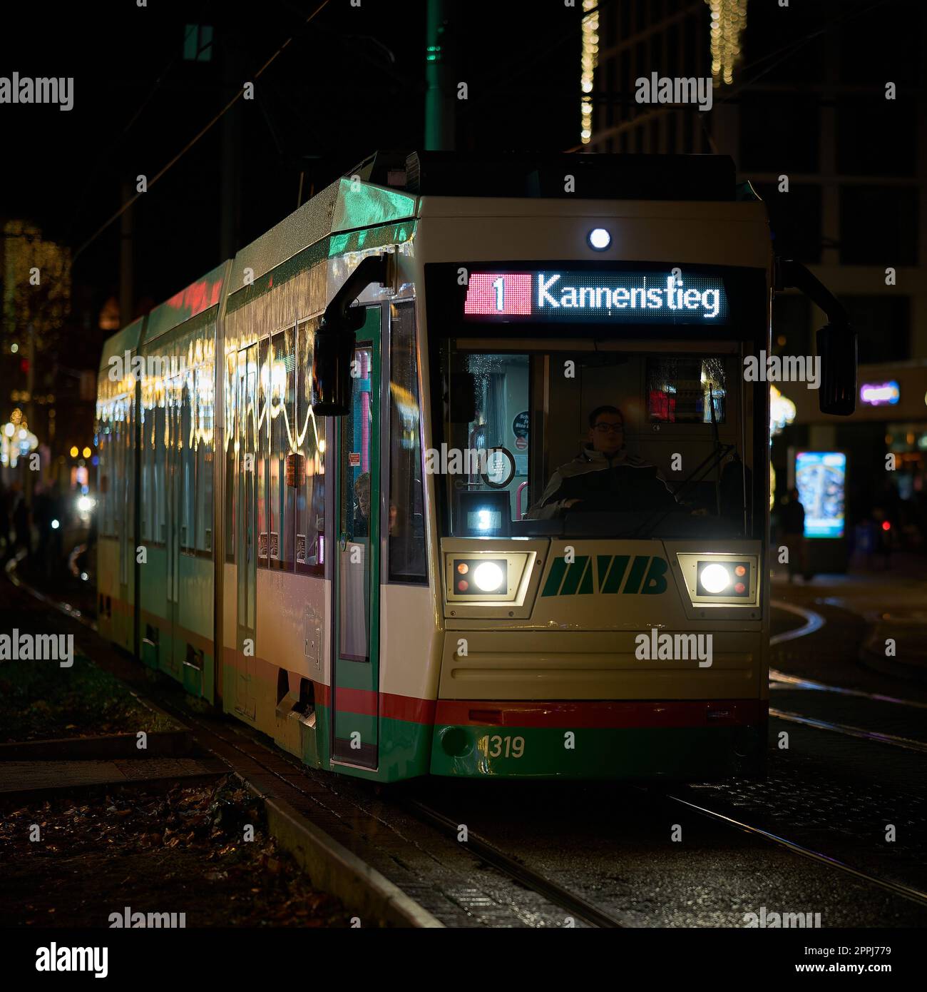 Tram of the Magdeburger Verkehrsbetriebe, MVB, at a stop in the city ...