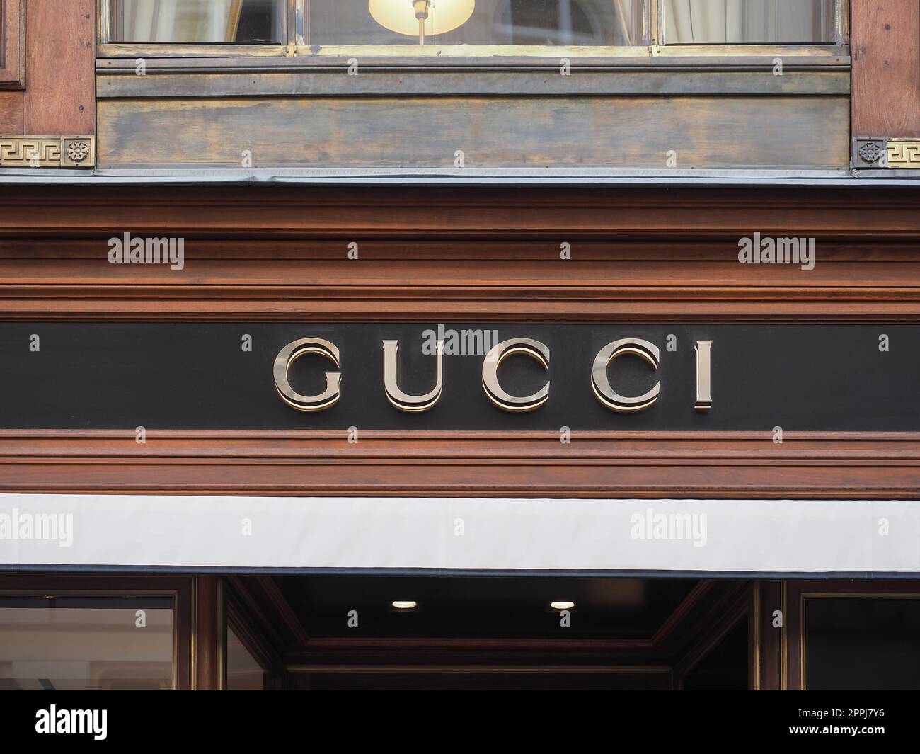 Gucci shopfront sign in Vienna Stock Photo - Alamy