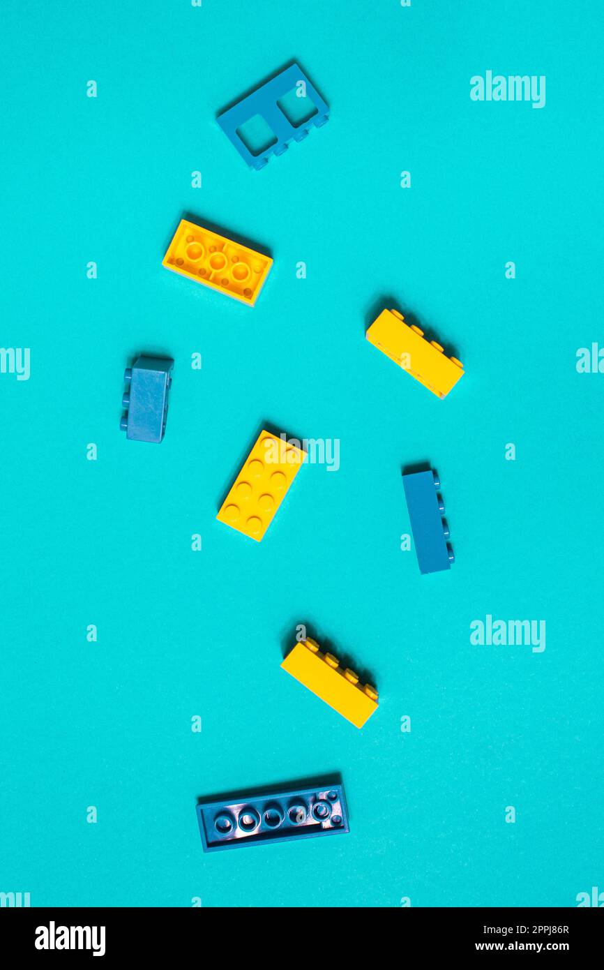 Constructor children plastic multi-colored on a pastel blue Stock Photo ...