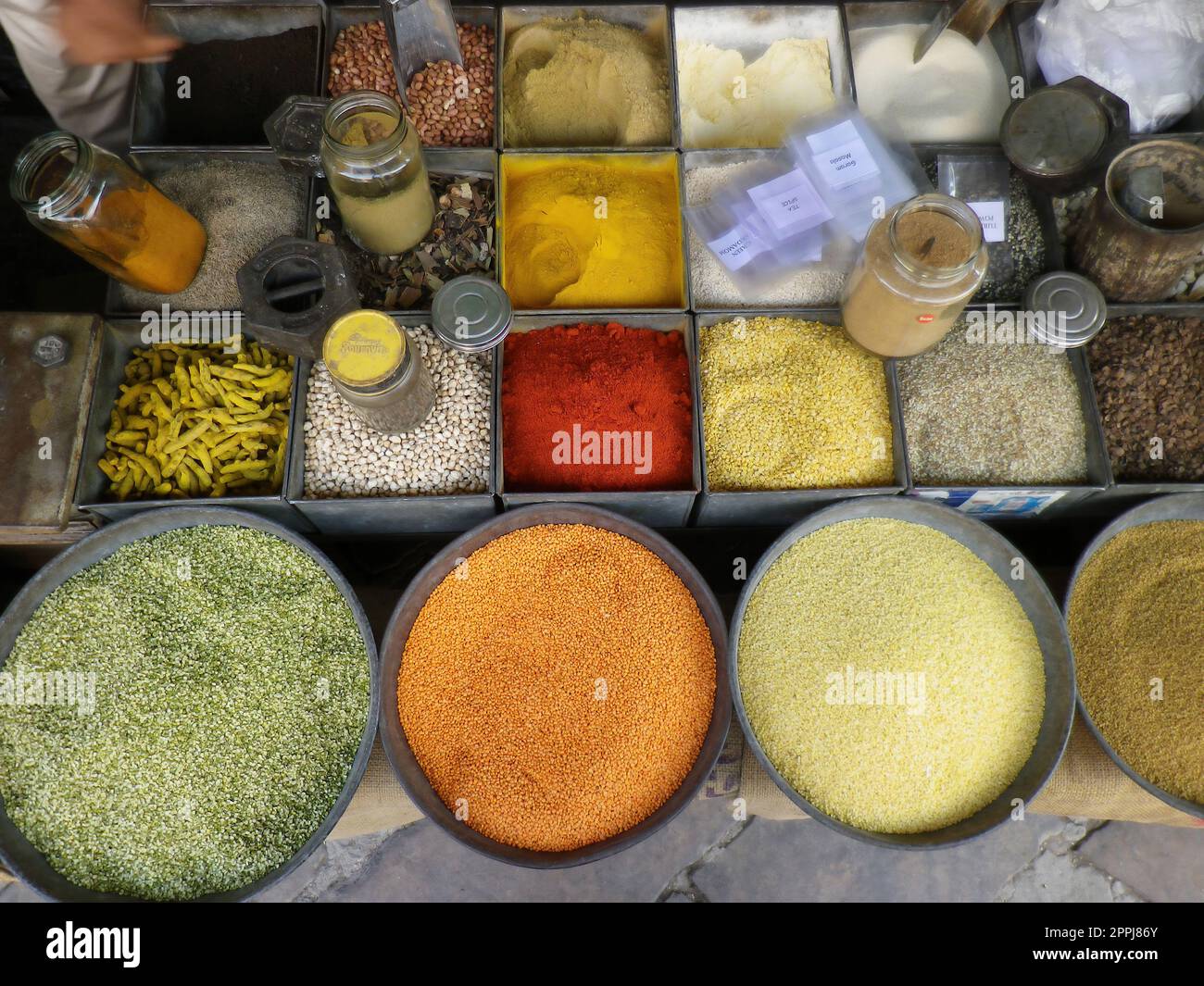 Spices and herbs background. Condiments on table Stock Photo - Alamy